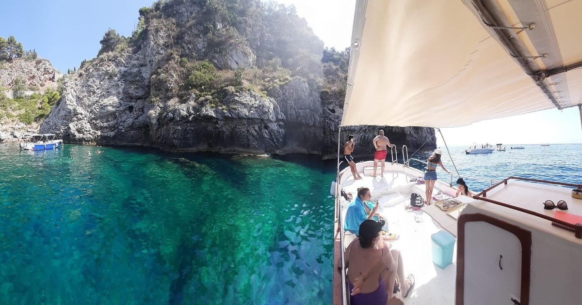 Giardini Naxos Taormina sunset dolphin watching tour | GetYourGuide