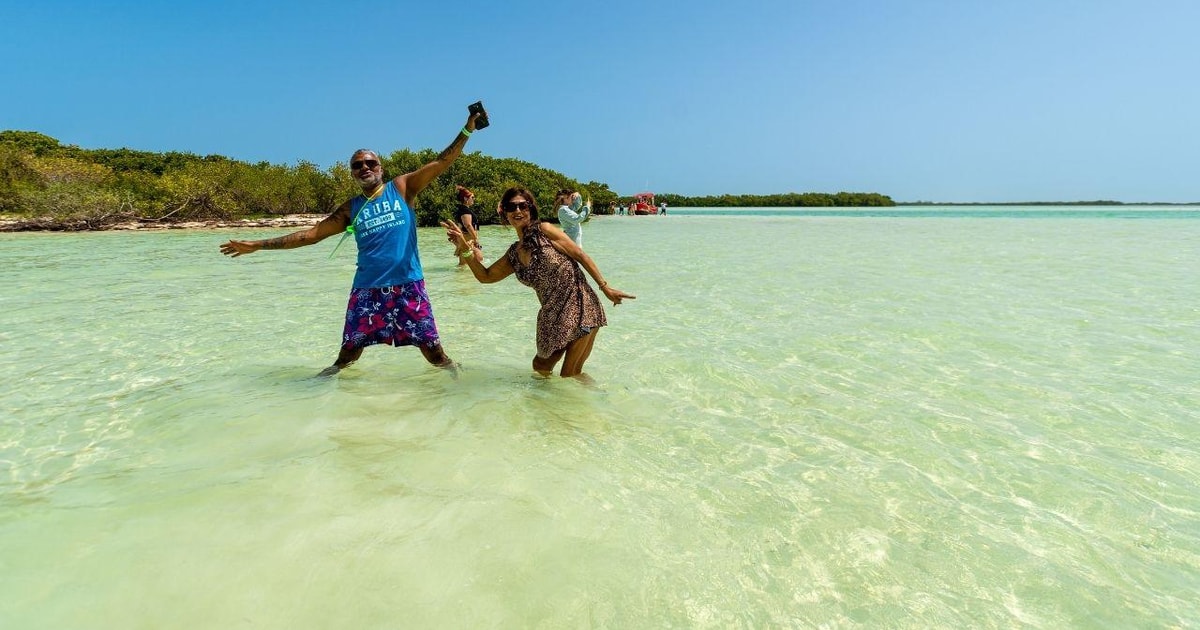 Holbox: Guided visit to the island, cenote swim and lunch | GetYourGuide