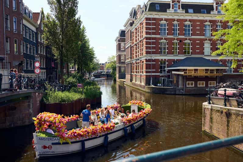 Amsterdam: The Original Flower Boat with Local Guide and Bar | GetYourGuide