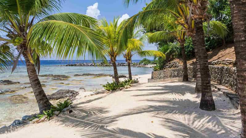 Ocean Breeze Beach Club with Transport and Lunch | GetYourGuide