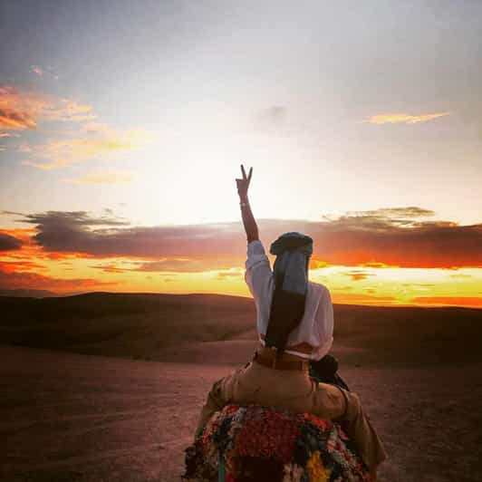 Agafay desert: ATV, Camel Ride , Henna tatto, Dinner in Camp | GetYourGuide