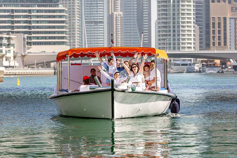 Dubai: Sunset Abra Boat Tour in Dubai Marina, Ain Dubai, JBR | GetYourGuide