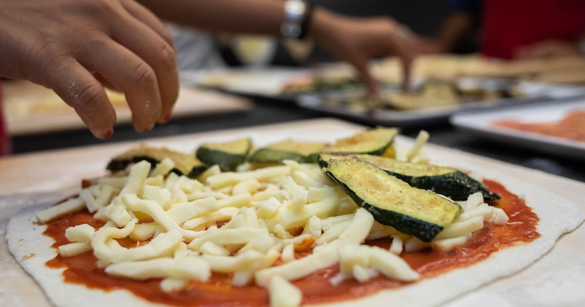 Rome: Pasta & Pizza making class with Tiber Island Visit | GetYourGuide