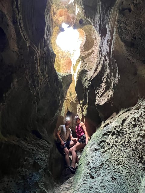 San Juan: Caves & Waterfall Adventure in Charco Azul | GetYourGuide