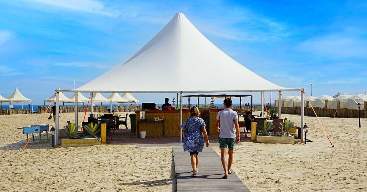 Doha: Desert Adventure, Inland Sea, and Camp Dinner | GetYourGuide