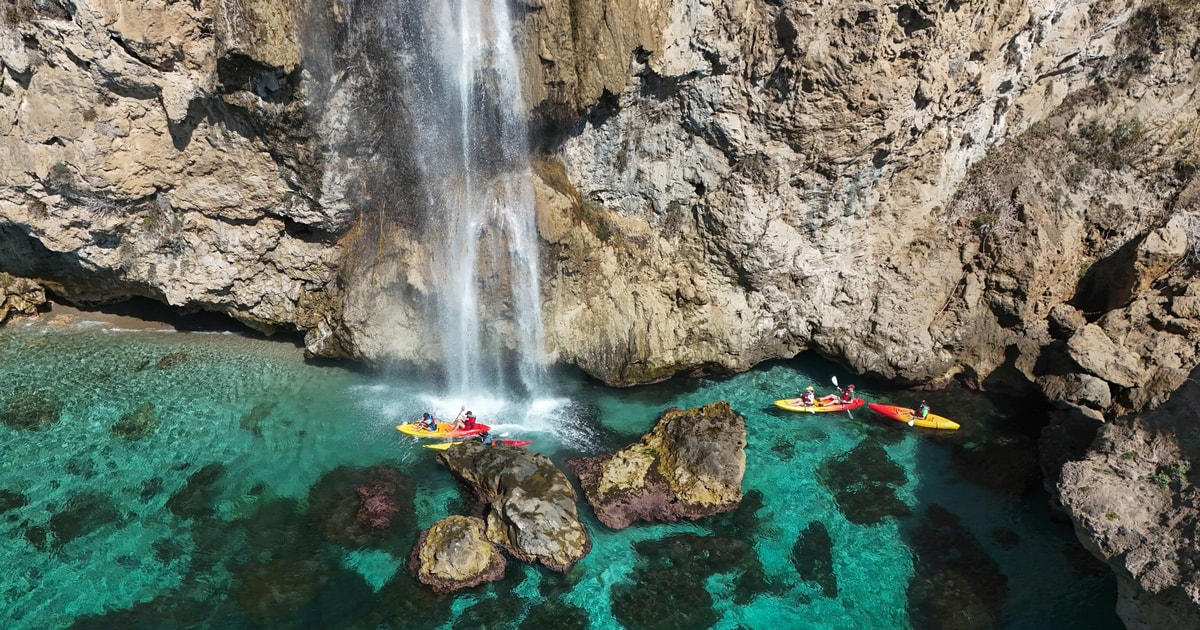 Nerja: Self-Guided Kayak Tour. Maro Waterfall. Support boat for the ...