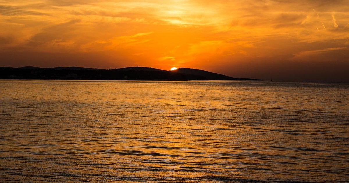 From Split: Sunset Panoramic Cruise, Nighttime Dip & Dinner | GetYourGuide