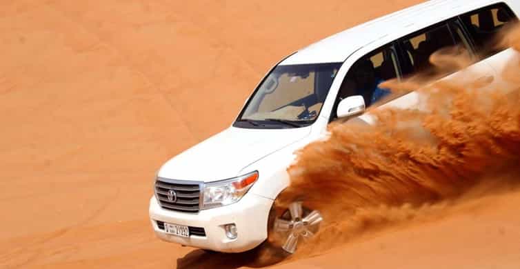 Dubai: Luxury Desert Safari Tour, Dinner, Show & Camel Ride | GetYourGuide