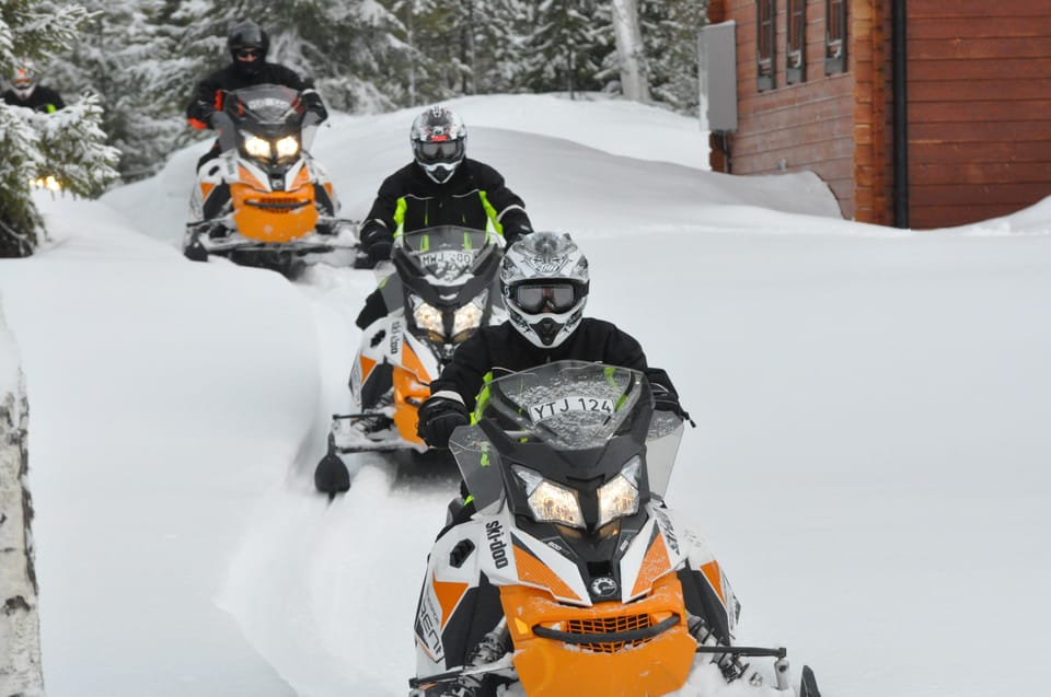 Swedish Lapland: Snowmobile safari | GetYourGuide