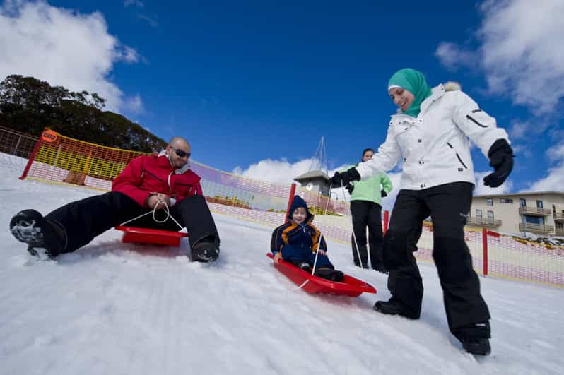Great Private Tours Luxe Bus Lake Mountain Snow Play Tour | GetYourGuide