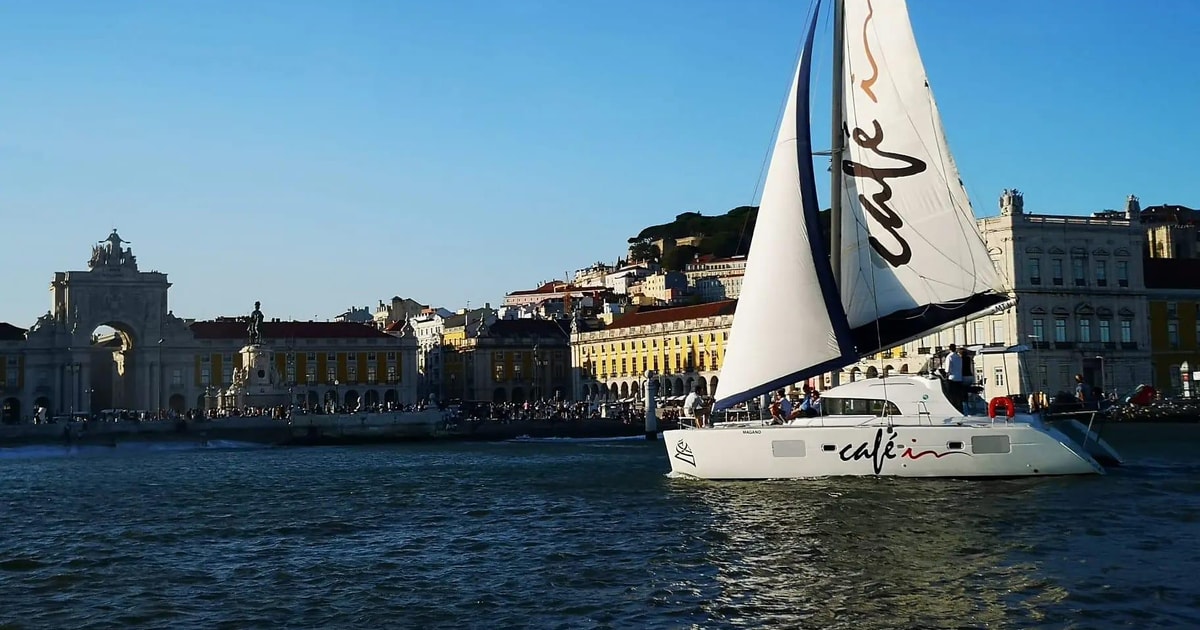 Catamaran ride on the Tagus River, with music and drinks. | GetYourGuide