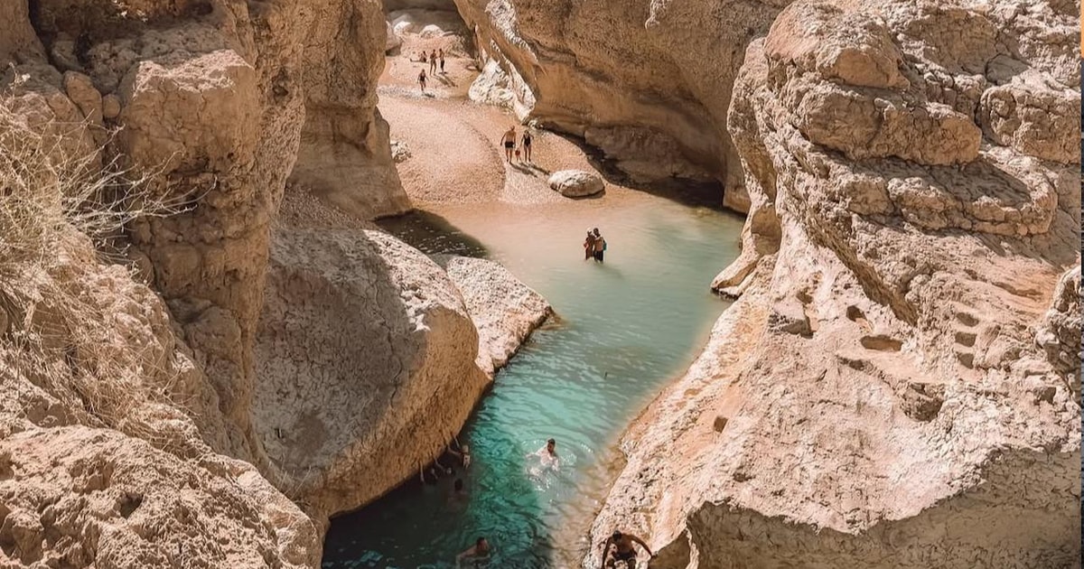 wadi shab + bimmah sinkhole from muscat (small group of 5) | GetYourGuide