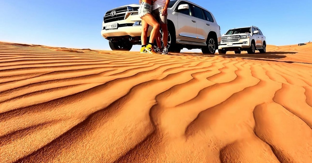 Inland Sea Desert Safari With Camel Ride and Dune Bashing | GetYourGuide