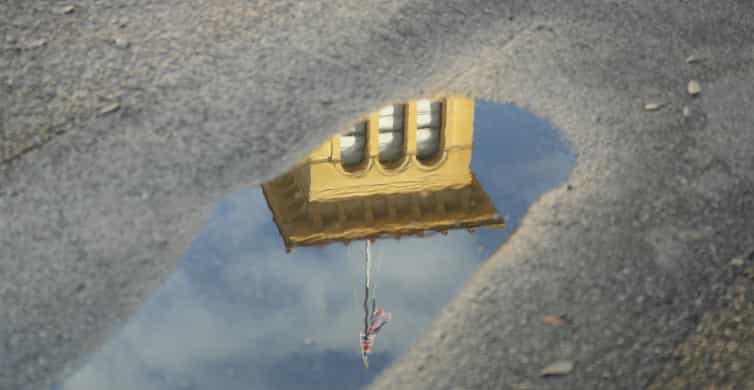 Urban photo - Puddle Art | GetYourGuide