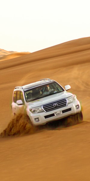 Qatar Desert Safari: Camel Ride, Sandboarding, Inland Sea. | GetYourGuide