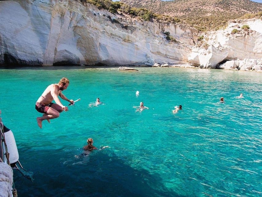 Milos: Kleftiko Bay Catamaran Cruise with Meal & Sunset View | GetYourGuide