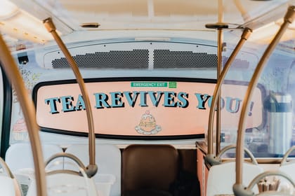 London: Afternoon Tea Bus with a Glass of Prosecco | GetYourGuide