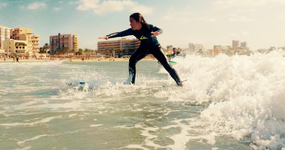Mallorca: Beginner's Surfing Group Lesson | GetYourGuide