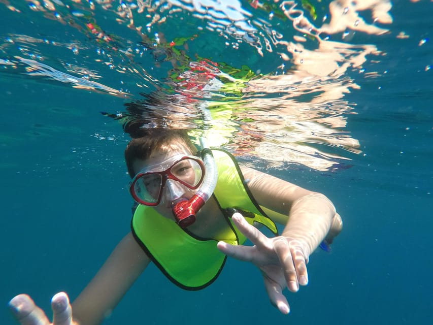 El Cielo reef by Catamaran with Beach Break | GetYourGuide