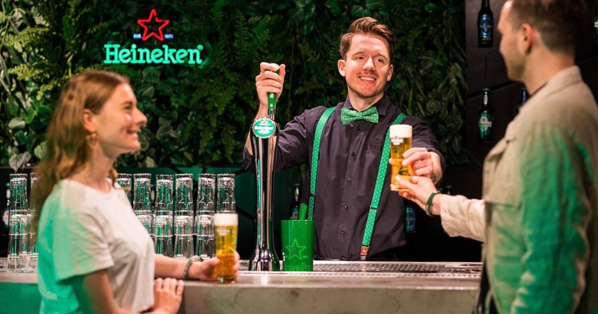 Amsterdam City Tour & Exclusive Heineken Rooftop (2 Drinks) | GetYourGuide