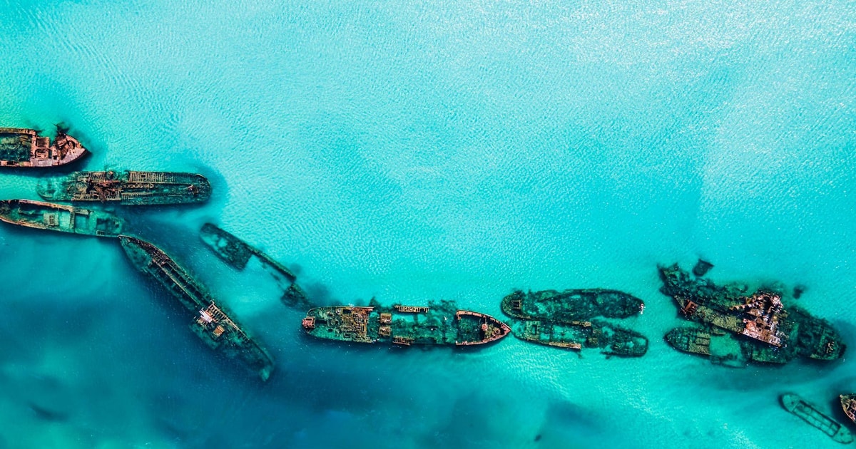 Guldkysten: Moreton Island dagsudflugt med kajak og sandboarding ...