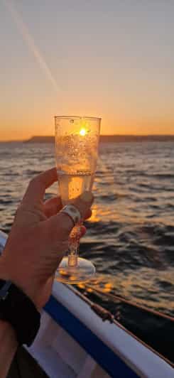 NEW Lagos: Traditional Sailing Sunset Tour w/Prosecco | GetYourGuide