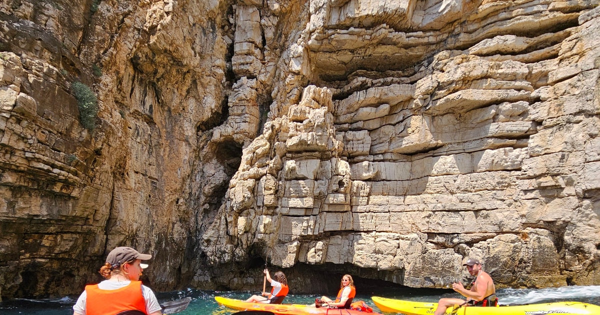 Pula: Cave Kayak Tour, Snorkeling and Island Jumping | GetYourGuide