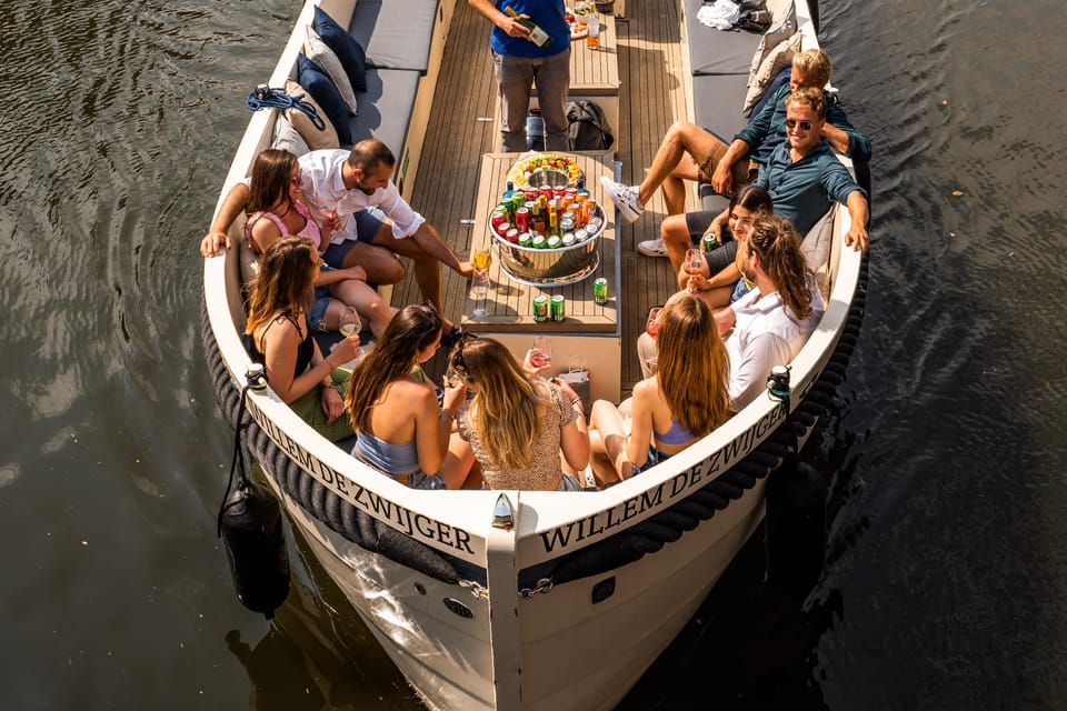Amsterdam: Day Drinking Boat with Unlimited Drinks & Mimosas | GetYourGuide