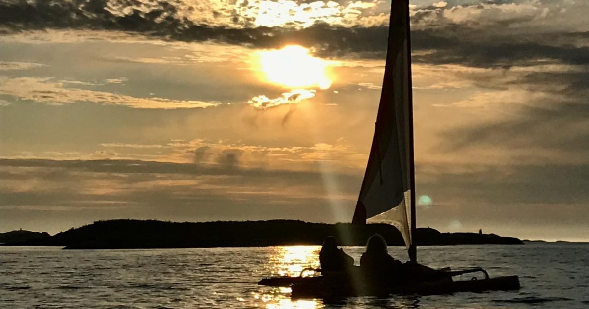 Exclusive in Norway, Sommarøy: Midnight sun in a Hobie sail kayak | GetYourGuide
