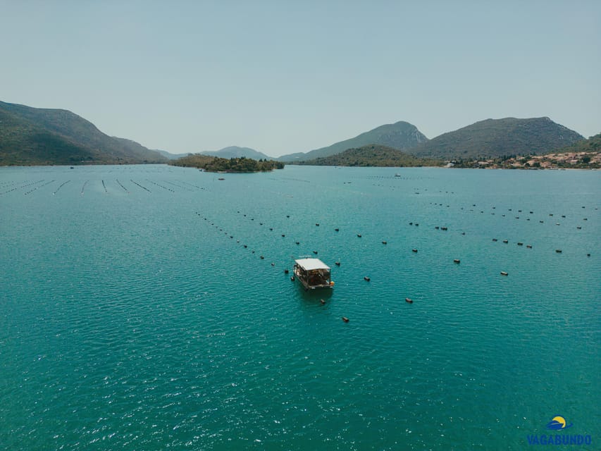 Boat tour - visit Ston Walls and tasting oysters on farm | GetYourGuide