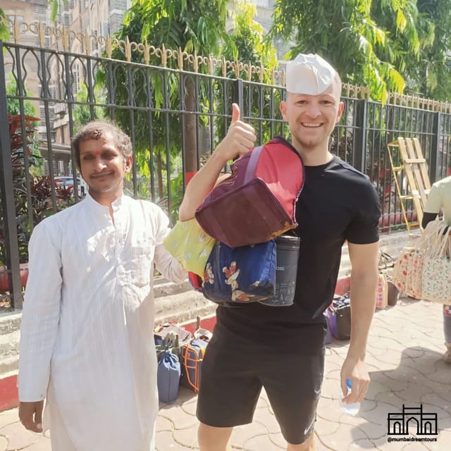 Meet Dabbawala Visit Dhobi Ghat & Dharavi slum with Train | GetYourGuide