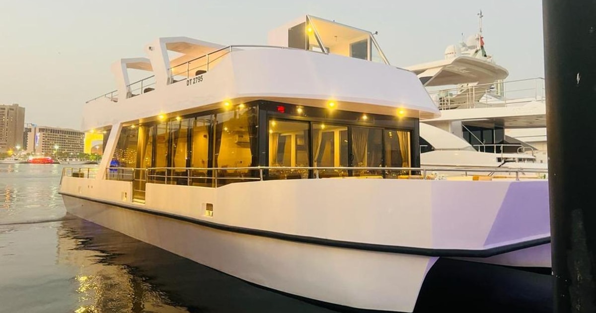 Catamaran Dubai Canal Cruise Dinner with Buffet dinner | GetYourGuide