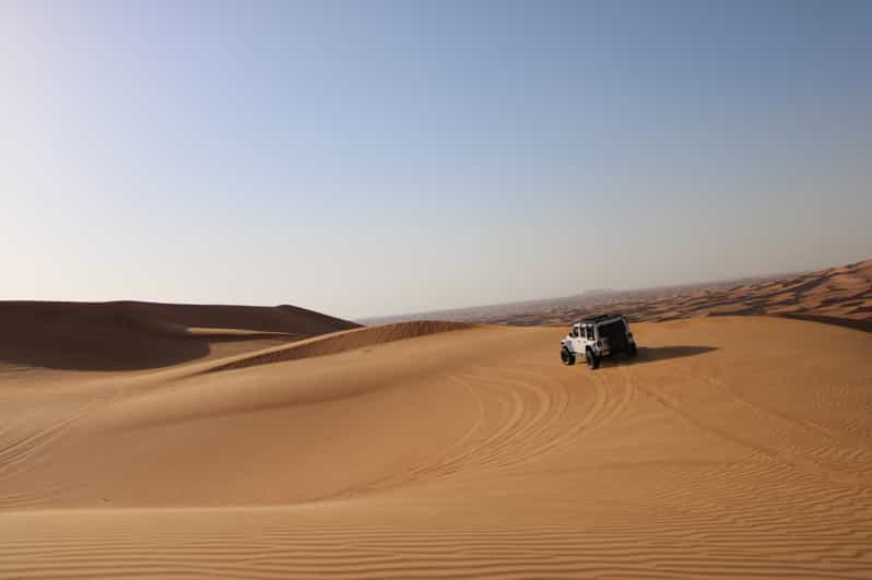 Dubai Jeep Wrangler Sunset Desert Experience & Sandboarding | GetYourGuide