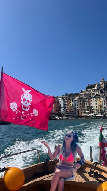 Amazing sunset on the pink Hyena in Portovenere | GetYourGuide