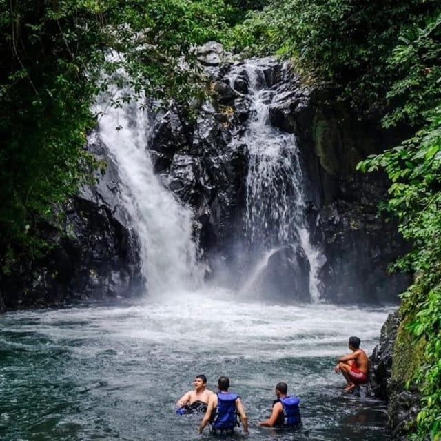Jumping Sliding at Aling- Aling Waterfall and Handara Gate | GetYourGuide