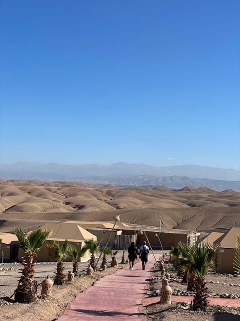 Dinner Show at Agafay desert & Traditional Outfit Photoshoot | GetYourGuide