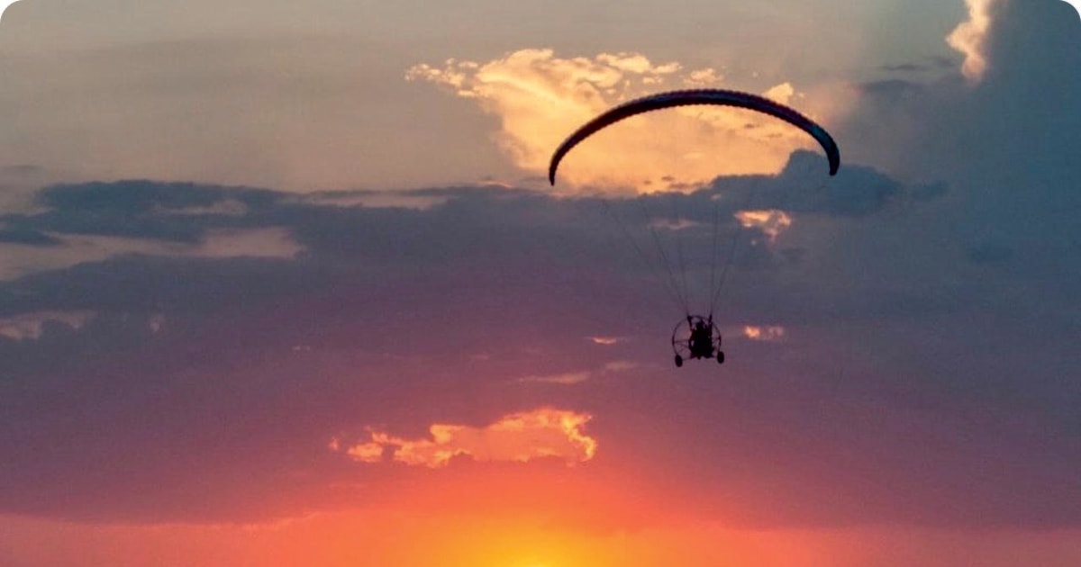 Ibiza: 25min Motorized Paragliding Flight around the Island | GetYourGuide
