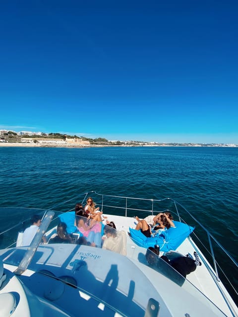 Lisbon: 4H Private Catamaran Tour with Swimming | GetYourGuide