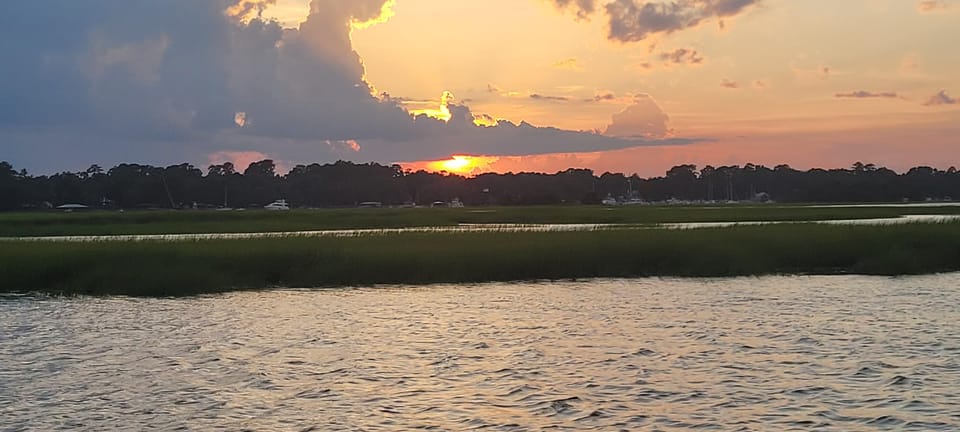 Sunset Cruise leaving from historic Isle of Hope Marina | GetYourGuide