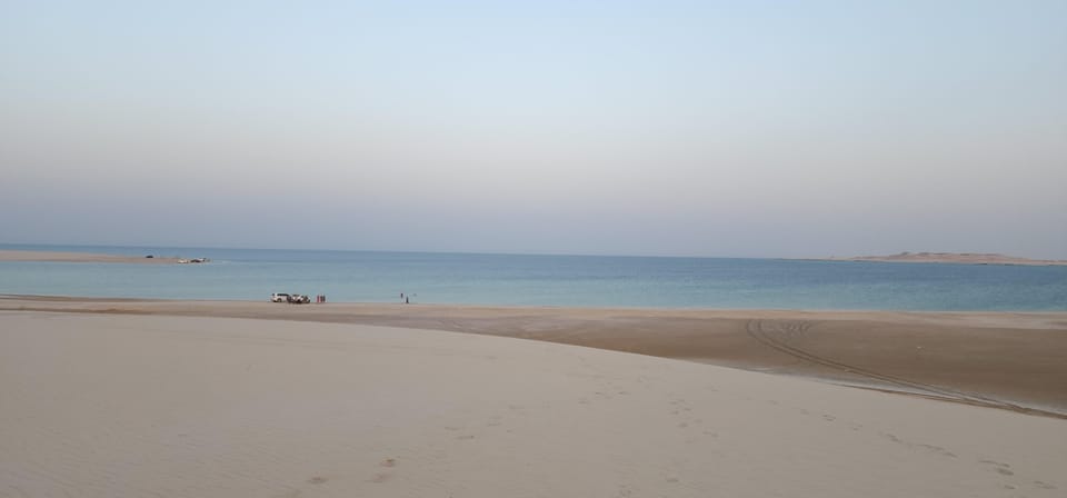 Doha: Desert Safari with Sandboarding and Inland Sea | GetYourGuide