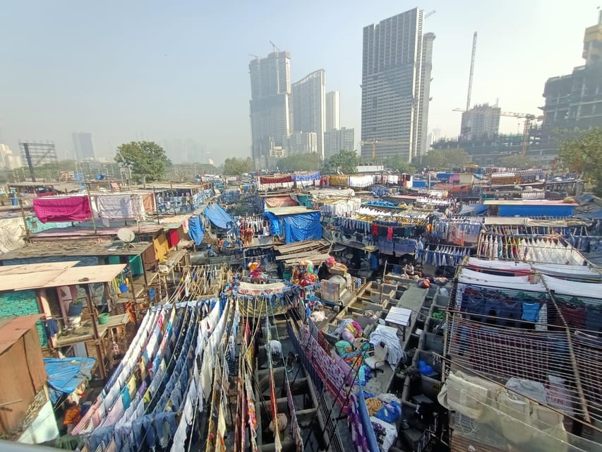 Mumbai: Visita al barrio marginal de Dharavi y Dhobi Ghat con viaje en ...