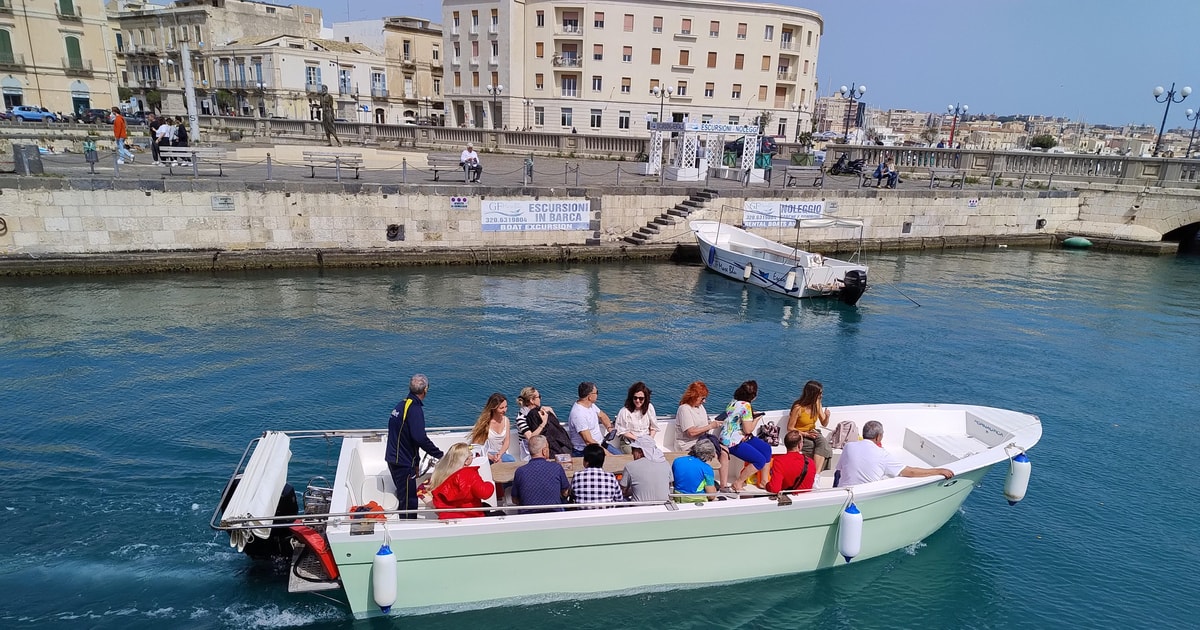 1-hour boat tour of Ortigia, sea caves with swimming stop | GetYourGuide