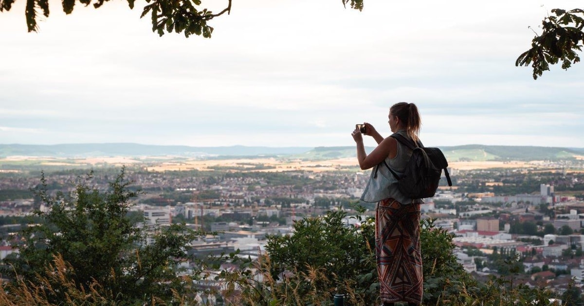 tour by night with the red sightseeing bus | GetYourGuide