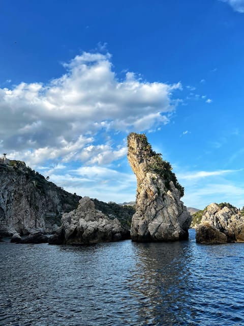 Giardini Naxos Taormina sunset dolphin watching tour | GetYourGuide