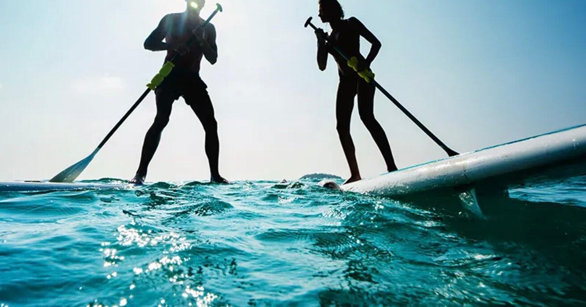Ibiza: Stand up Paddle surf Guided sea caves tour | GetYourGuide