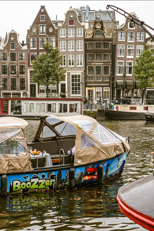 Amsterdam overdag boot privé rondvaart met gids | GetYourGuide