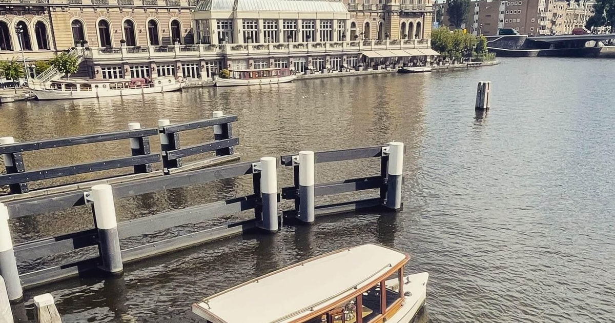 Amsterdam: Luxus Private Grachtenfahrt in Deutsch mit Getränke | GetYourGuide