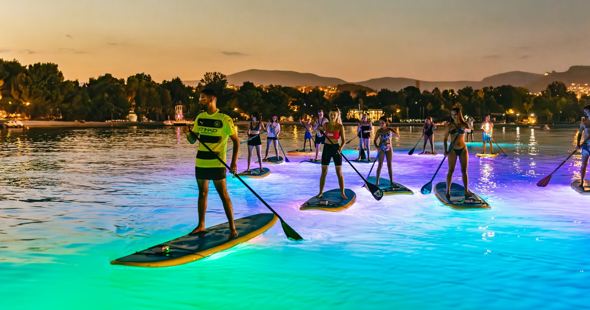 Split: Stand Up Paddleboard Night Glow Tour | GetYourGuide