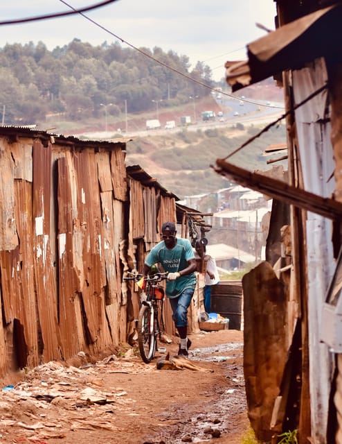 Visit a local Bar, Seeing the overview of the slum, Walking. | GetYourGuide