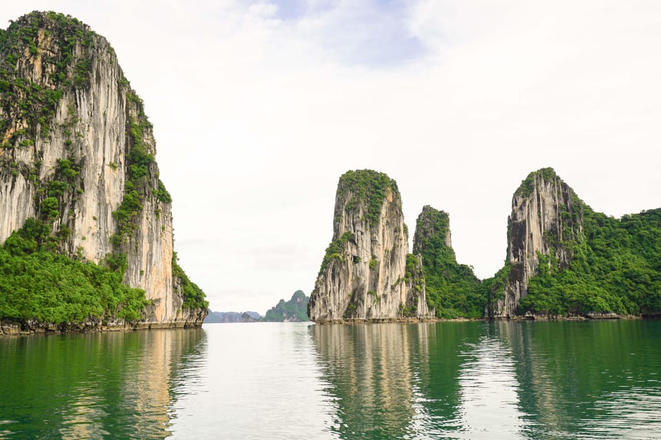 Explore Ha long Bay With Thien Cung Cave, Kayak, Lunch, Bus | GetYourGuide